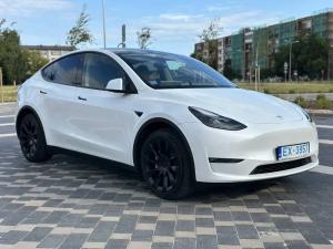 White Tesla Model Y 2023 in Jelgava, with an engine capacity of 0.00 L and mileage of 89 thousand km for 38000 €, photo 8 on AUTOMOTO.COM.LV