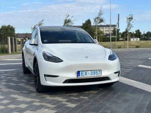 White Tesla Model Y 2023 in Jelgava, with an engine capacity of 0.00 L and mileage of 89 thousand km for 38000 €, photo 9 on AUTOMOTO.COM.LV