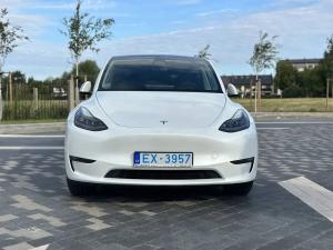White Tesla Model Y 2023 in Jelgava, with an engine capacity of 0.00 L and mileage of 89 thousand km for 38000 €, photo 10 on AUTOMOTO.COM.LV