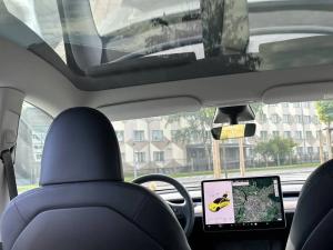 White Tesla Model Y 2023 in Jelgava, with an engine capacity of 0.00 L and mileage of 89 thousand km for 38000 €, photo 13 on AUTOMOTO.COM.LV