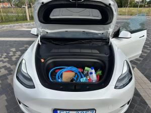 White Tesla Model Y 2023 in Jelgava, with an engine capacity of 0.00 L and mileage of 89 thousand km for 38000 €, photo 23 on AUTOMOTO.COM.LV