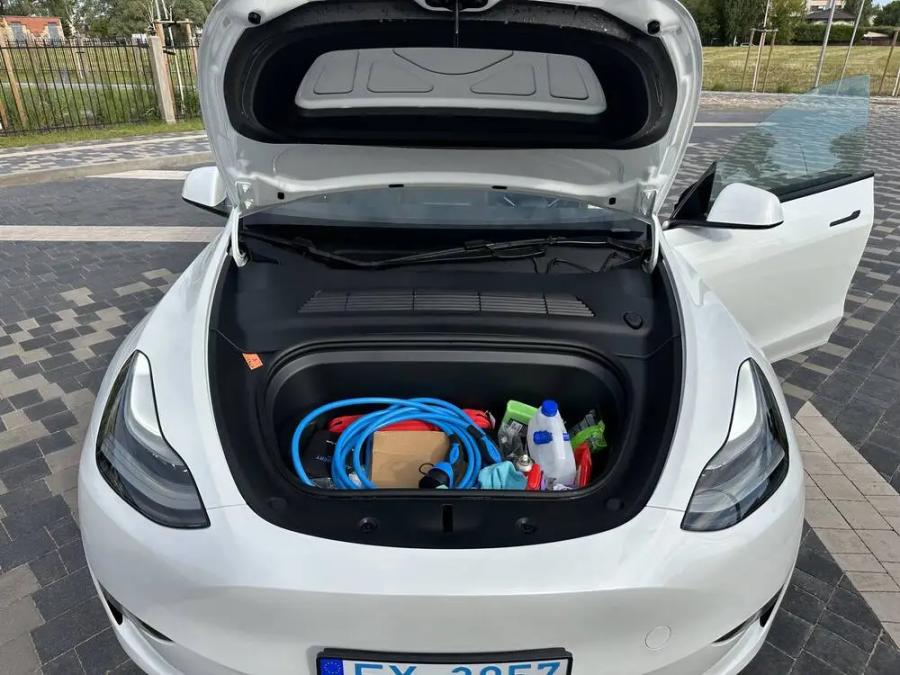 White Tesla Model Y 2023 in Jelgava, with an engine capacity of 0.00 L and mileage of 89 thousand km for 38000 €, photo 23 on AUTOMOTO.COM.LV