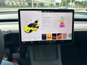 White Tesla Model Y 2023 in Jelgava, with an engine capacity of 0.00 L and mileage of 89 thousand km for 38000 €, photo 28 on AUTOMOTO.COM.LV