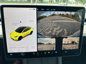 White Tesla Model Y 2023 in Jelgava, with an engine capacity of 0.00 L and mileage of 89 thousand km for 38000 €, photo 31 on AUTOMOTO.COM.LV