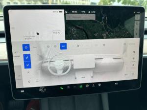 White Tesla Model Y 2023 in Jelgava, with an engine capacity of 0.00 L and mileage of 89 thousand km for 38000 €, photo 33 on AUTOMOTO.COM.LV