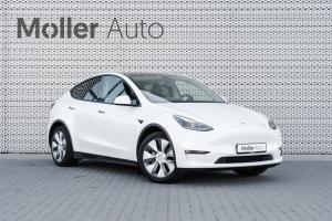 White Tesla Model Y 2023 in Marupe, with an engine capacity of 0.00 L and mileage of 78 thousand km for 41200 €, photo 3 on AUTOMOTO.COM.LV