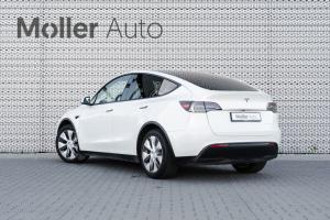 White Tesla Model Y 2023 in Marupe, with an engine capacity of 0.00 L and mileage of 78 thousand km for 41200 €, photo 4 on AUTOMOTO.COM.LV