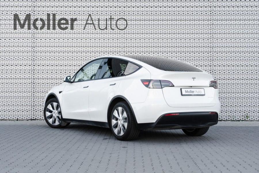White Tesla Model Y 2023 in Marupe, with an engine capacity of 0.00 L and mileage of 78 thousand km for 41200 €, photo 4 on AUTOMOTO.COM.LV