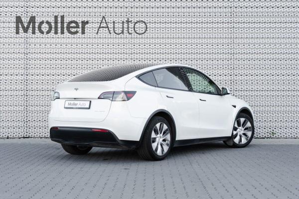 White Tesla Model Y 2023 in Marupe, with an engine capacity of 0.00 L and mileage of 78 thousand km for 41200 €, photo 5 on AUTOMOTO.COM.LV
