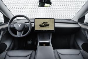 White Tesla Model Y 2023 in Marupe, with an engine capacity of 0.00 L and mileage of 78 thousand km for 41200 €, photo 7 on AUTOMOTO.COM.LV