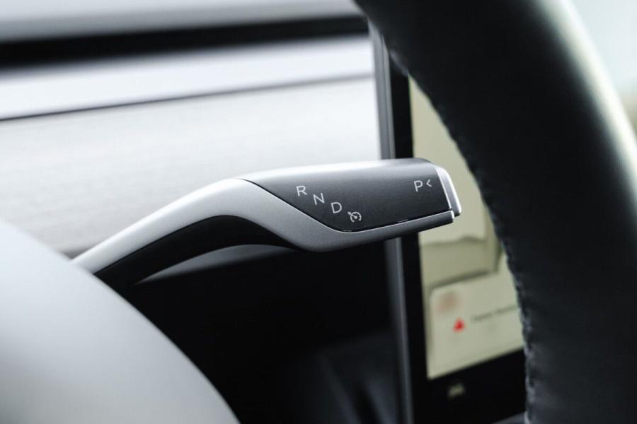 White Tesla Model Y 2023 in Marupe, with an engine capacity of 0.00 L and mileage of 78 thousand km for 41200 €, photo 12 on AUTOMOTO.COM.LV