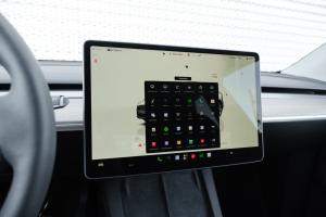 White Tesla Model Y 2023 in Marupe, with an engine capacity of 0.00 L and mileage of 78 thousand km for 41200 €, photo 13 on AUTOMOTO.COM.LV