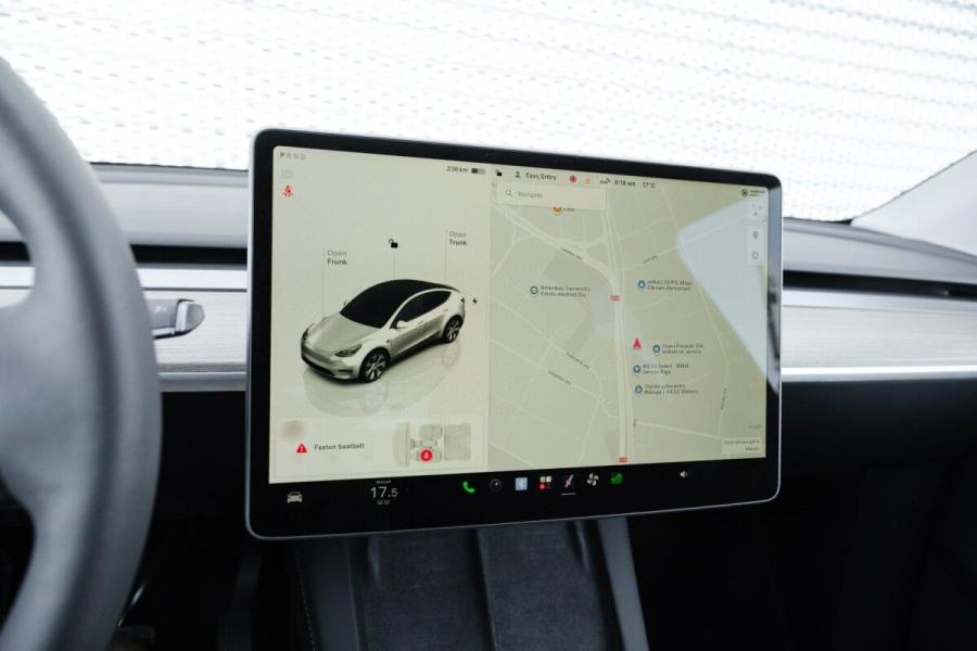 White Tesla Model Y 2023 in Marupe, with an engine capacity of 0.00 L and mileage of 78 thousand km for 41200 €, photo 16 on AUTOMOTO.COM.LV