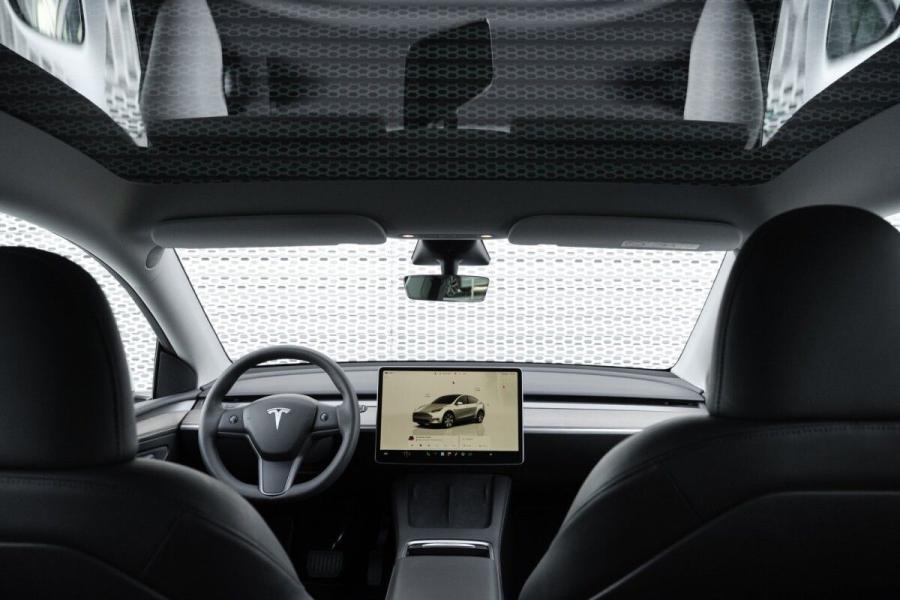 White Tesla Model Y 2023 in Marupe, with an engine capacity of 0.00 L and mileage of 78 thousand km for 41200 €, photo 20 on AUTOMOTO.COM.LV