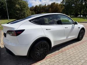 Balts Tesla Model Y 2023 Viļņa, ar dzinēja tilpumu 0.00 L un nobraukumu 48 tūkst. km par 30900 €, foto 7 vietnē AUTOMOTO.COM.LV