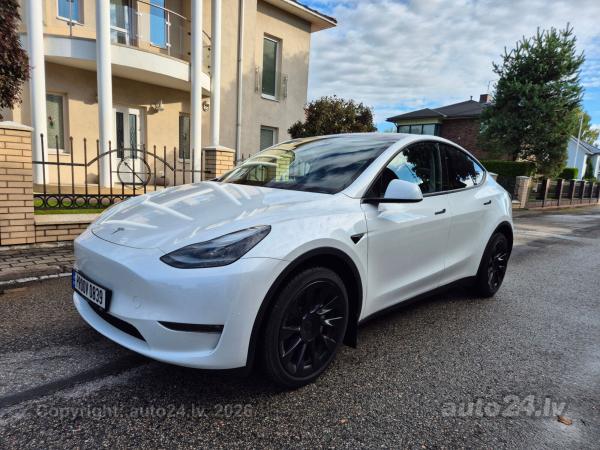 White Tesla Model Y 2023 in Tartu, with an engine capacity of 0.00 L and mileage of 73 thousand km for 36790 €, photo 1 on AUTOMOTO.COM.LV