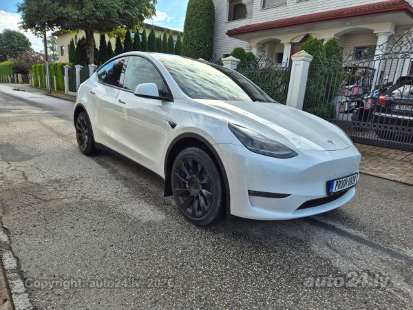 White Tesla Model Y 2023 in Tartu, with an engine capacity of 0.00 L and mileage of 73 thousand km for 36790 €, photo 9 on AUTOMOTO.COM.LV