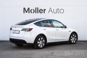 White Tesla Model Y 2023 in Riga, with an engine capacity of 0.00 L and mileage of 62 thousand km for 39500 €, photo 5 on AUTOMOTO.COM.LV