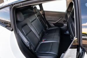 White Tesla Model Y 2023 in Riga, with an engine capacity of 0.00 L and mileage of 62 thousand km for 39500 €, photo 8 on AUTOMOTO.COM.LV