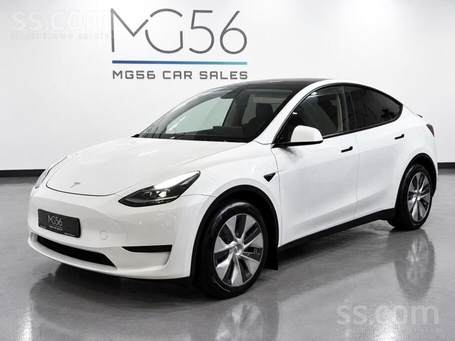 White Tesla Model Y 2023 in Riga, with an engine capacity of 0.00 L and mileage of 19 thousand km for 32900 €, photo 4 on AUTOMOTO.COM.LV