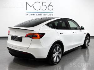 White Tesla Model Y 2023 in Riga, with an engine capacity of 0.00 L and mileage of 19 thousand km for 32900 €, photo 6 on AUTOMOTO.COM.LV