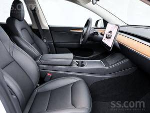 White Tesla Model Y 2023 in Riga, with an engine capacity of 0.00 L and mileage of 19 thousand km for 32900 €, photo 10 on AUTOMOTO.COM.LV