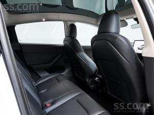 White Tesla Model Y 2023 in Riga, with an engine capacity of 0.00 L and mileage of 19 thousand km for 32900 €, photo 12 on AUTOMOTO.COM.LV