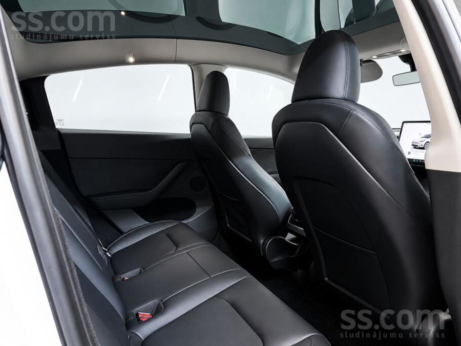 White Tesla Model Y 2023 in Riga, with an engine capacity of 0.00 L and mileage of 19 thousand km for 32900 €, photo 12 on AUTOMOTO.COM.LV