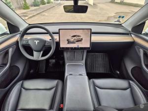 Balts Tesla Model Y 2023 Mažeikiai, ar dzinēja tilpumu 0.00 L un nobraukumu 111 tūkst. km par 20400 €, foto 10 vietnē AUTOMOTO.COM.LV