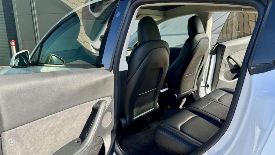 Balts Tesla Model Y 2023 Viļņa, ar dzinēja tilpumu 0.00 L un nobraukumu 50 tūkst. km par 28500 €, foto 17 vietnē AUTOMOTO.COM.LV