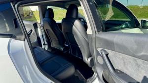 Balts Tesla Model Y 2023 Viļņa, ar dzinēja tilpumu 0.00 L un nobraukumu 50 tūkst. km par 28500 €, foto 18 vietnē AUTOMOTO.COM.LV