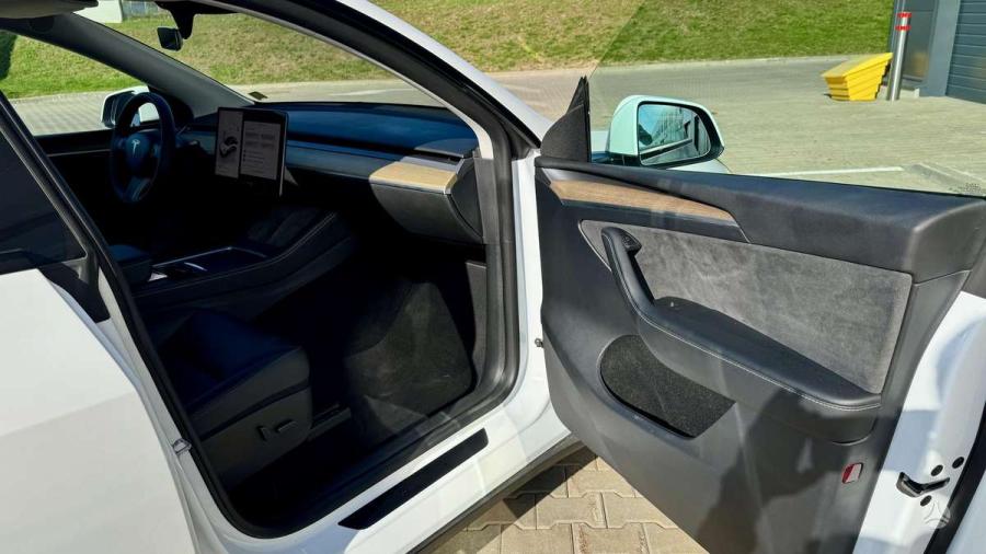 Balts Tesla Model Y 2023 Viļņa, ar dzinēja tilpumu 0.00 L un nobraukumu 50 tūkst. km par 28500 €, foto 20 vietnē AUTOMOTO.COM.LV