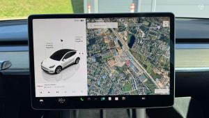 Balts Tesla Model Y 2023 Viļņa, ar dzinēja tilpumu 0.00 L un nobraukumu 50 tūkst. km par 28500 €, foto 24 vietnē AUTOMOTO.COM.LV