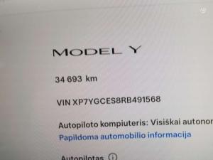 White Tesla Model Y 2024 in Kaunas, with an engine capacity of 0.00 L and mileage of 34 thousand km for 12300 €, photo 22 on AUTOMOTO.COM.LV