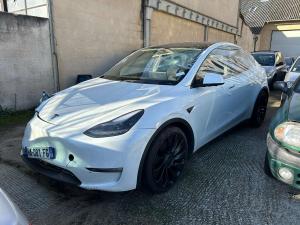 White Tesla Model Y 2024 in Vilnius, with an engine capacity of 0.00 L and mileage of 59 thousand km for 17800 €, photo  on AUTOMOTO.COM.LV