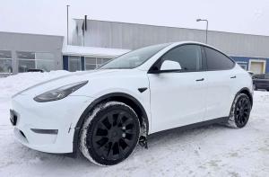 White Tesla Model Y 2024 in Siauliai, with an engine capacity of 0.00 L and mileage of 88 thousand km for 29400 €, photo  on AUTOMOTO.COM.LV