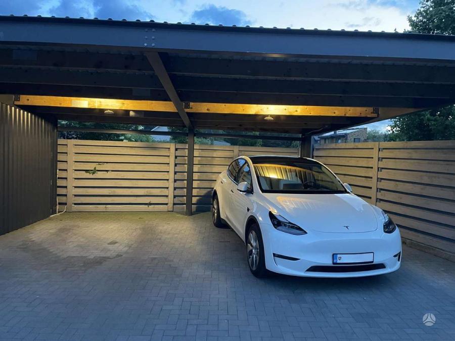 White Tesla Model Y 2024 in Klaipeda, with an engine capacity of 0.00 L and mileage of 46 thousand km for 45500 €, photo 6 on AUTOMOTO.COM.LV