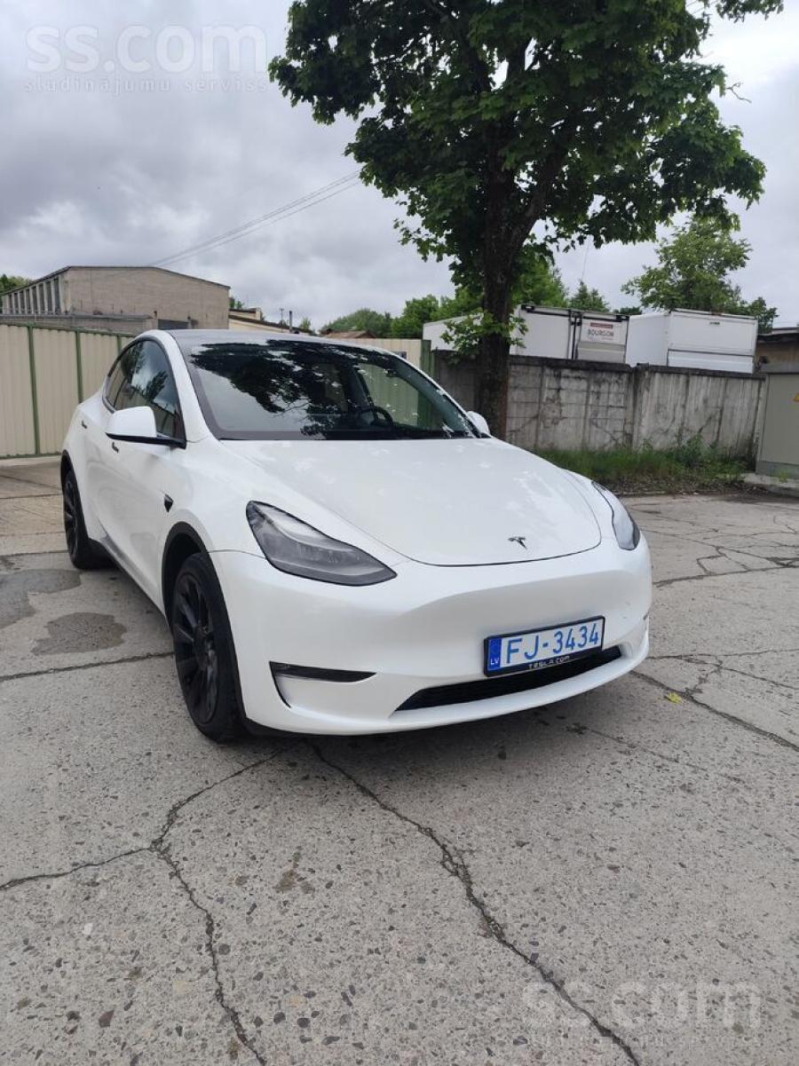 Balts Tesla Model Y 2024 Rīga, ar dzinēja tilpumu 0.00 L un nobraukumu 79 tūkst. km par 34500 €, foto 1 vietnē AUTOMOTO.COM.LV