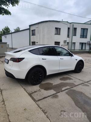Balts Tesla Model Y 2024 Rīga, ar dzinēja tilpumu 0.00 L un nobraukumu 79 tūkst. km par 34500 €, foto 4 vietnē AUTOMOTO.COM.LV