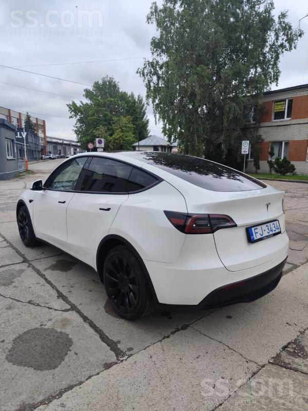 Balts Tesla Model Y 2024 Rīga, ar dzinēja tilpumu 0.00 L un nobraukumu 79 tūkst. km par 34500 €, foto 5 vietnē AUTOMOTO.COM.LV