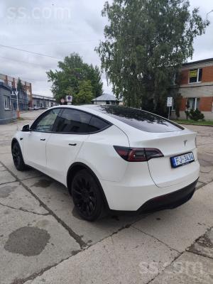 Balts Tesla Model Y 2024 Rīga, ar dzinēja tilpumu 0.00 L un nobraukumu 79 tūkst. km par 34500 €, foto 6 vietnē AUTOMOTO.COM.LV