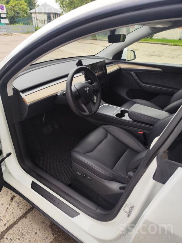 Balts Tesla Model Y 2024 Rīga, ar dzinēja tilpumu 0.00 L un nobraukumu 79 tūkst. km par 34500 €, foto 6 vietnē AUTOMOTO.COM.LV