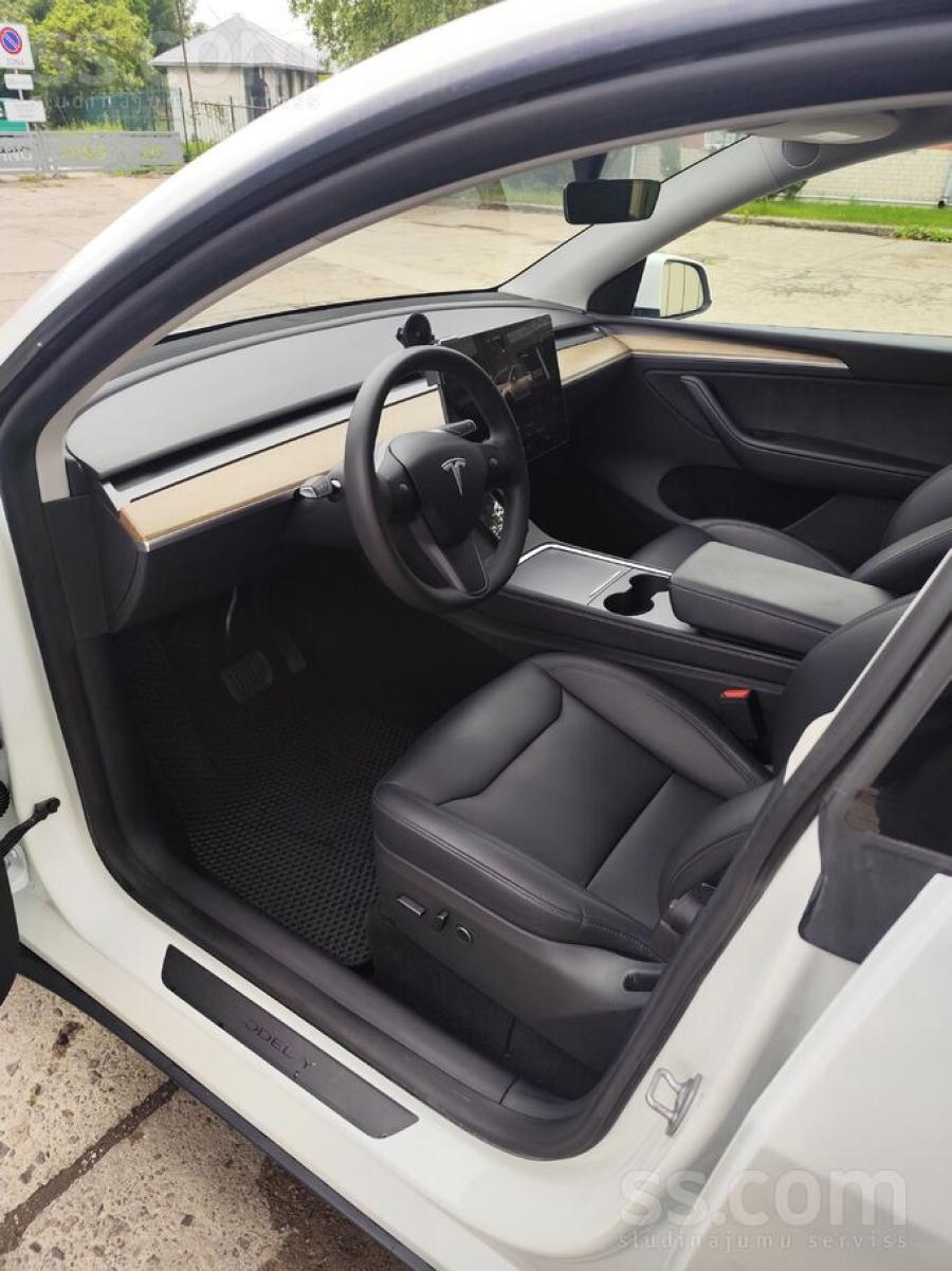 Balts Tesla Model Y 2024 Rīga, ar dzinēja tilpumu 0.00 L un nobraukumu 79 tūkst. km par 34500 €, foto 7 vietnē AUTOMOTO.COM.LV