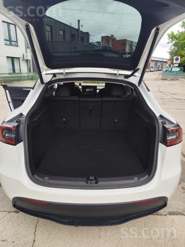 Balts Tesla Model Y 2024 Rīga, ar dzinēja tilpumu 0.00 L un nobraukumu 79 tūkst. km par 34500 €, foto 8 vietnē AUTOMOTO.COM.LV