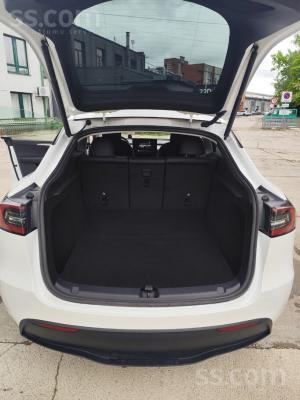 Balts Tesla Model Y 2024 Rīga, ar dzinēja tilpumu 0.00 L un nobraukumu 79 tūkst. km par 34500 €, foto 9 vietnē AUTOMOTO.COM.LV