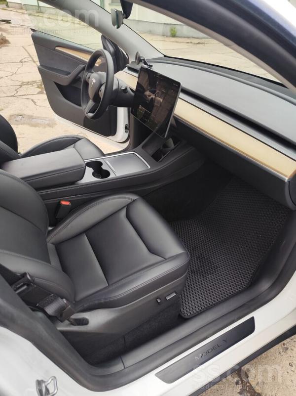 Balts Tesla Model Y 2024 Rīga, ar dzinēja tilpumu 0.00 L un nobraukumu 79 tūkst. km par 34500 €, foto 9 vietnē AUTOMOTO.COM.LV