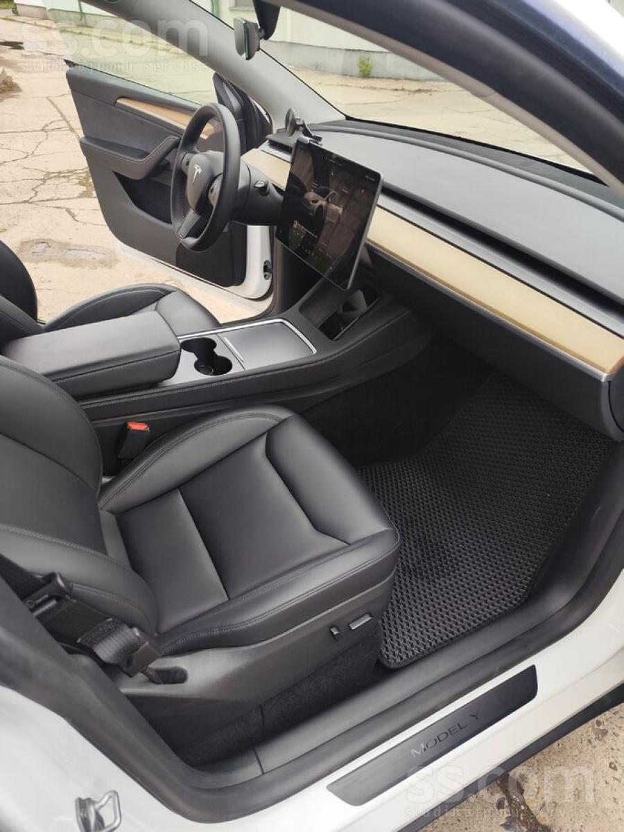 Balts Tesla Model Y 2024 Rīga, ar dzinēja tilpumu 0.00 L un nobraukumu 79 tūkst. km par 34500 €, foto 10 vietnē AUTOMOTO.COM.LV