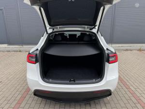 White Tesla Model Y 2024 in Kaunas, with an engine capacity of 0.00 L and mileage of 54 thousand km for 31500 €, photo 10 on AUTOMOTO.COM.LV