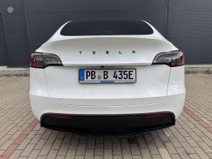 White Tesla Model Y 2024 in Kaunas, with an engine capacity of 0.00 L and mileage of 54 thousand km for 31500 €, photo 12 on AUTOMOTO.COM.LV