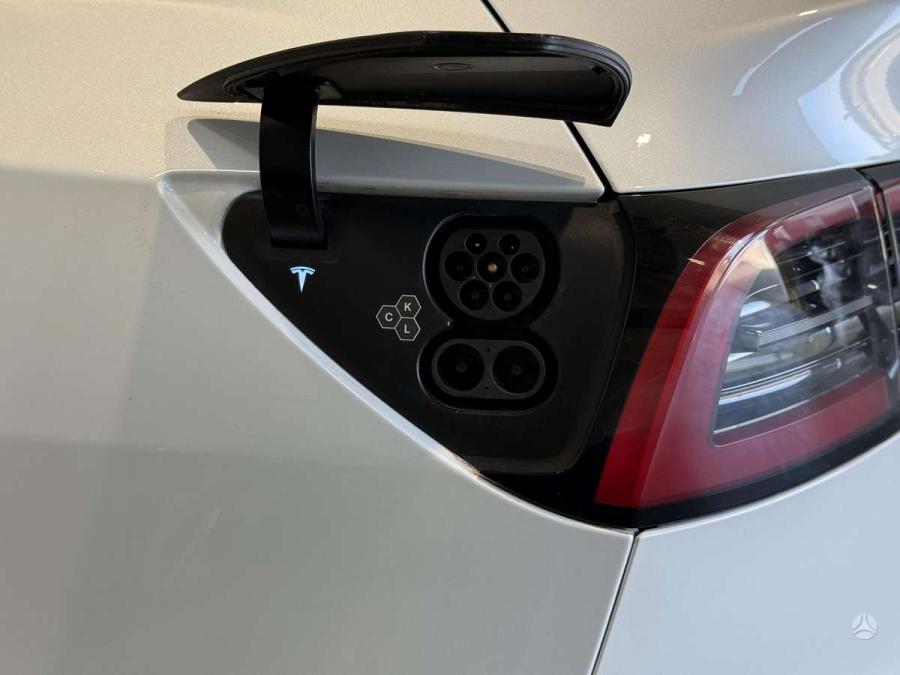 Balts Tesla Model Y 2024 Viļņa, ar dzinēja tilpumu 0.00 L un nobraukumu 66 tūkst. km par 33950 €, foto 18 vietnē AUTOMOTO.COM.LV